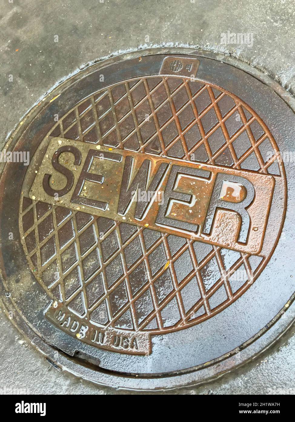 Industrial Wet Sewer Street Drain Cover Stock Photo - Alamy