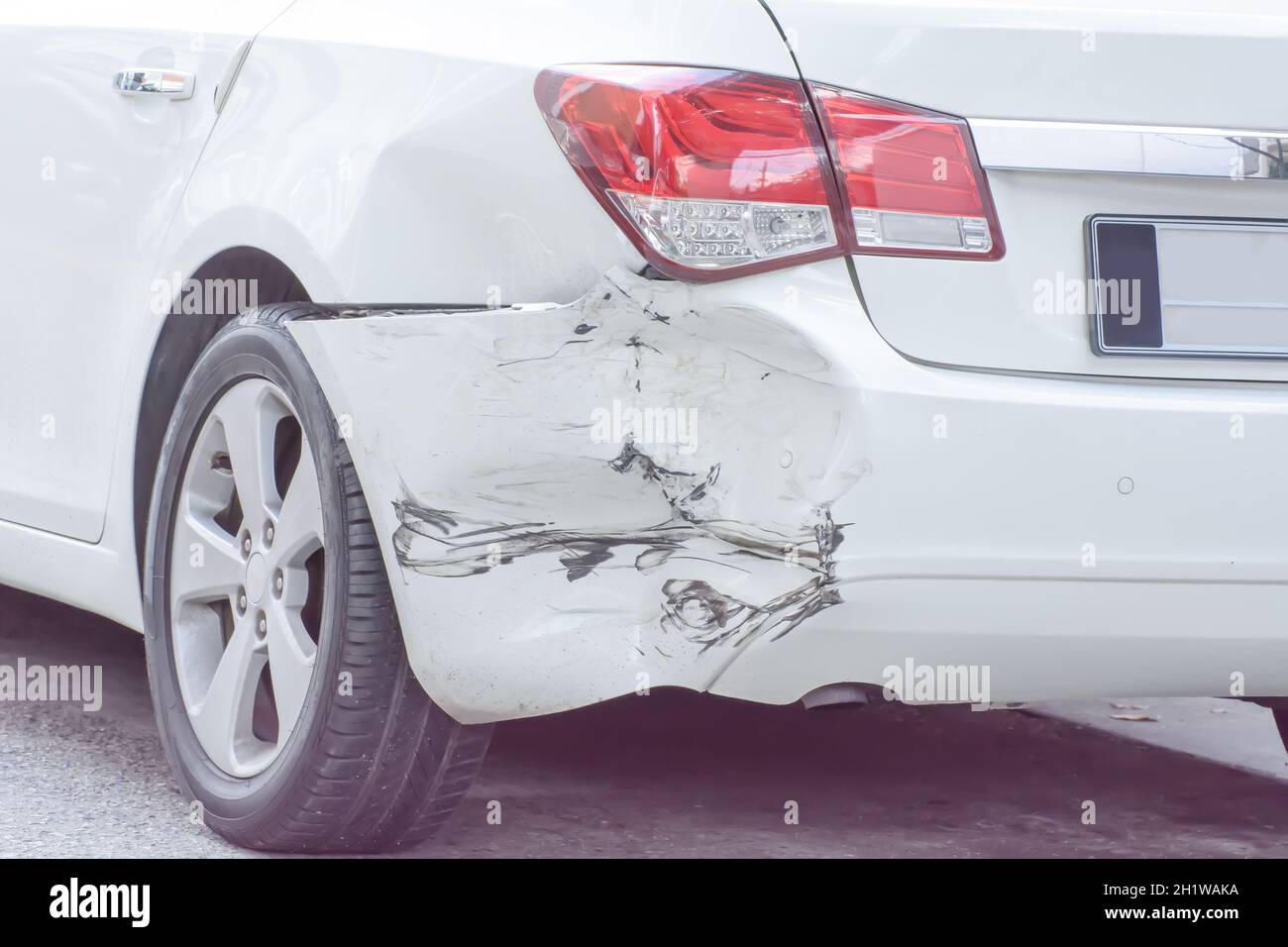 The white car was hit on the back Stock Photo - Alamy