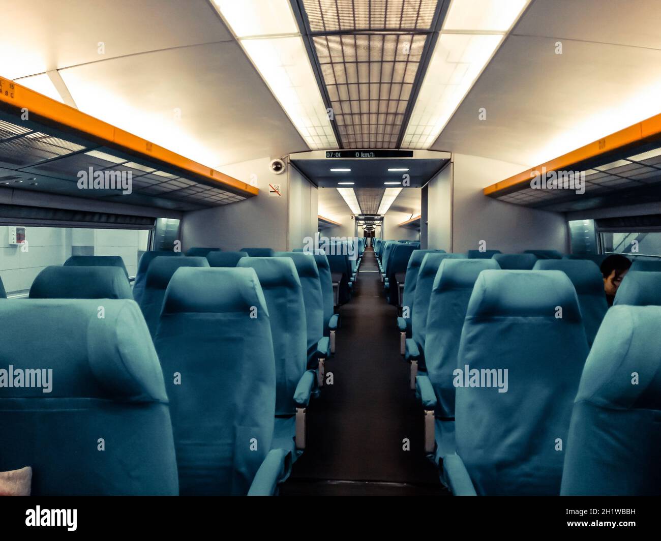 Blank space of chair back, inside high speed train compartment. An ...