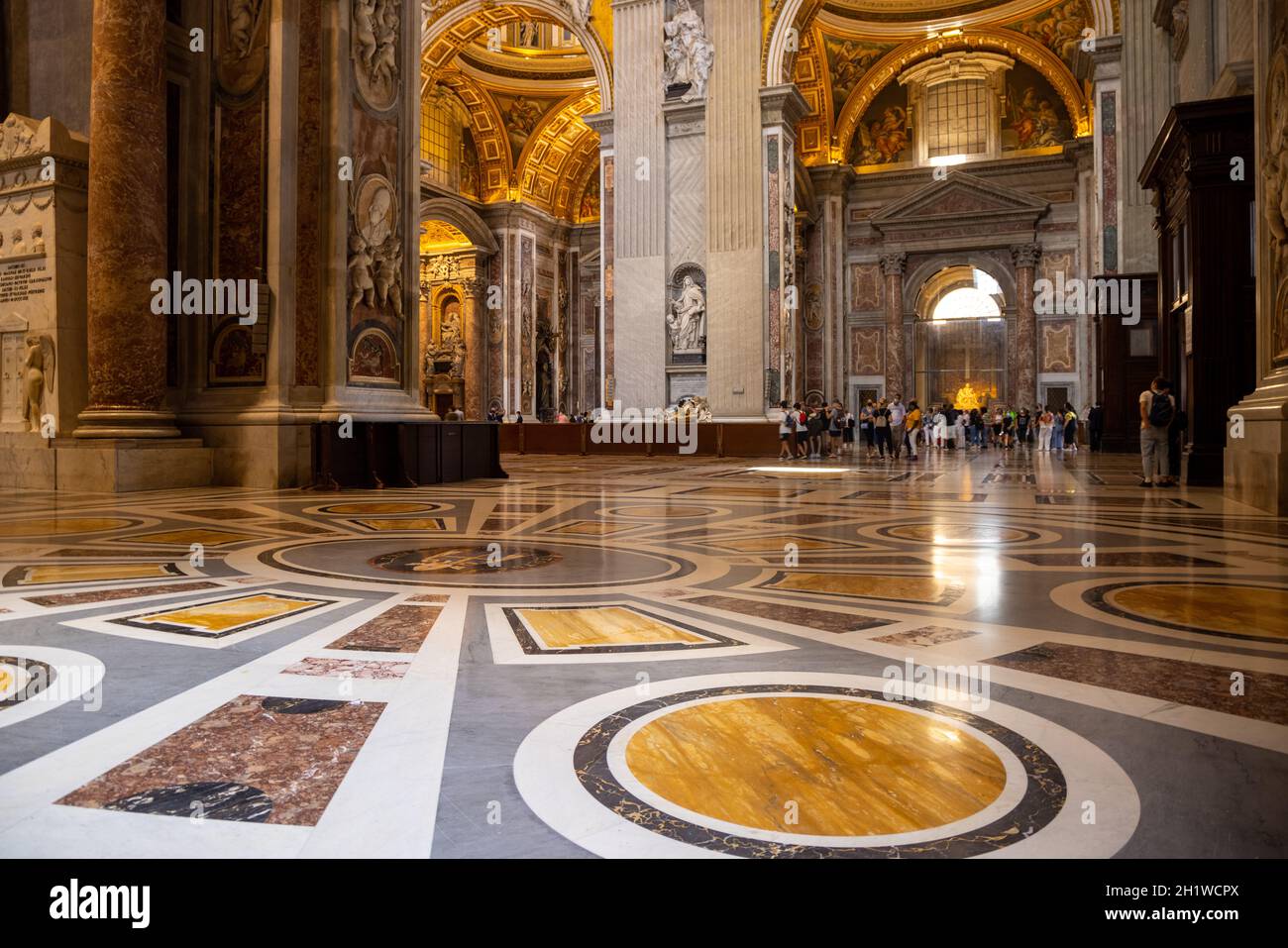 The interior of St. Peter's Basilica in Vatican City. It is the most ...