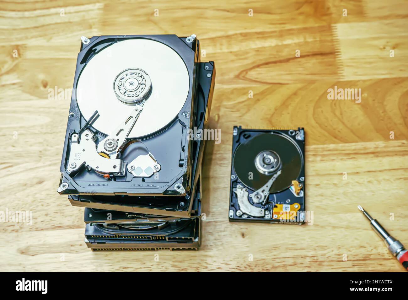 Hard disk drive removable case for repair on the wooden desk Stock ...