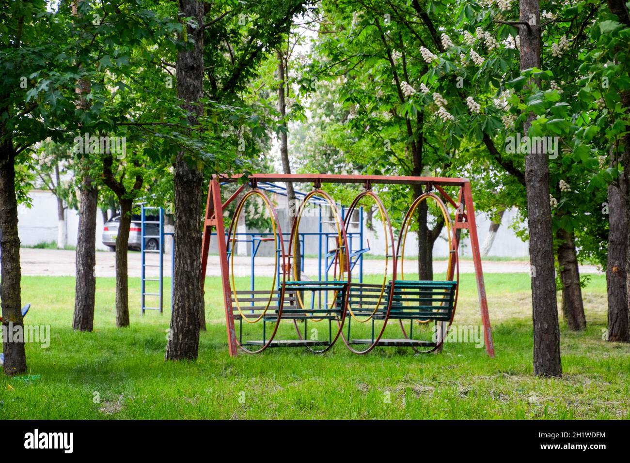 swing in the park. Playground for children's games in the park. Swing ...