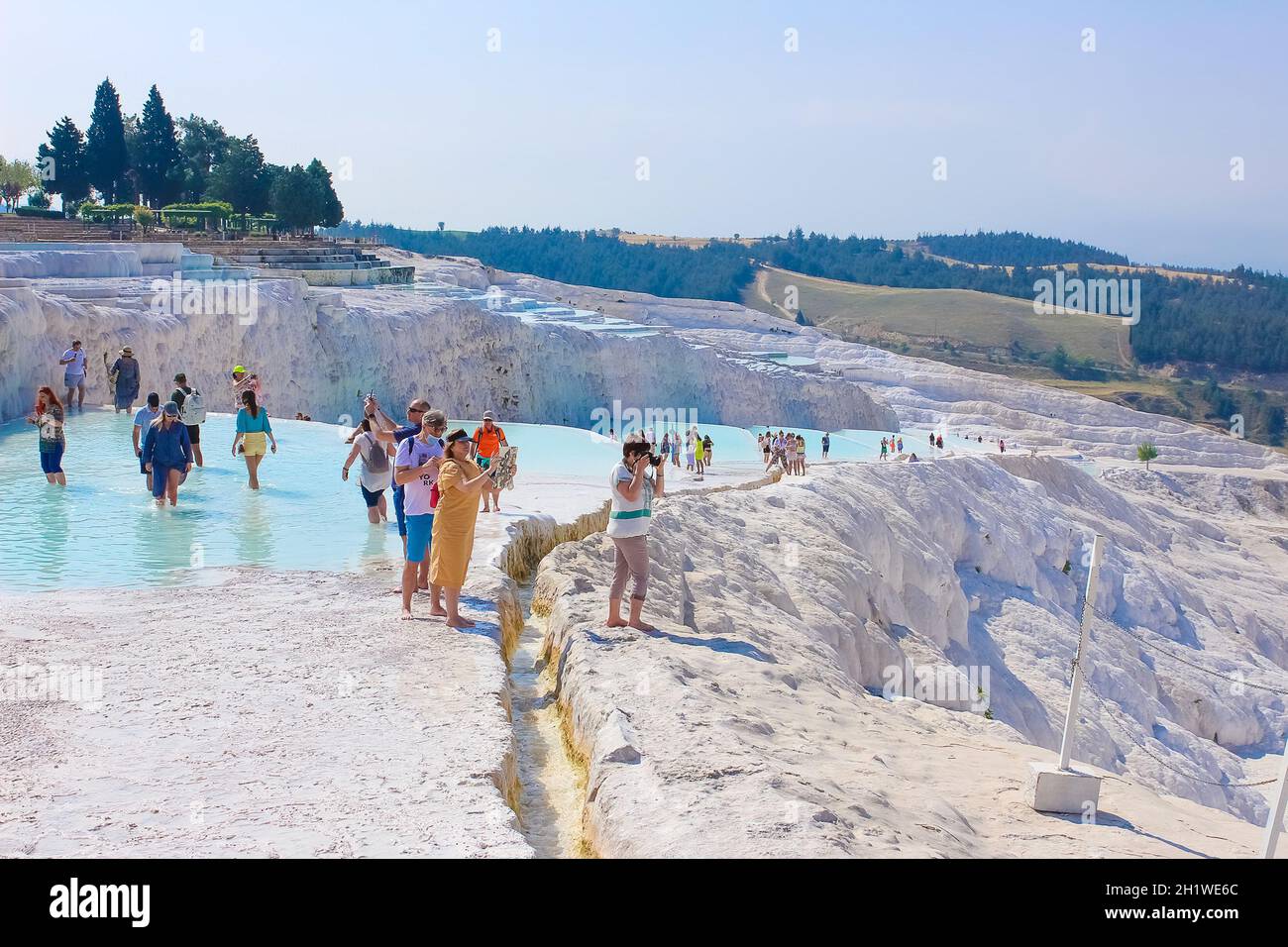 Pamukkale, Turkey- May 11, 2021: people walk at travertines in Turkey ...