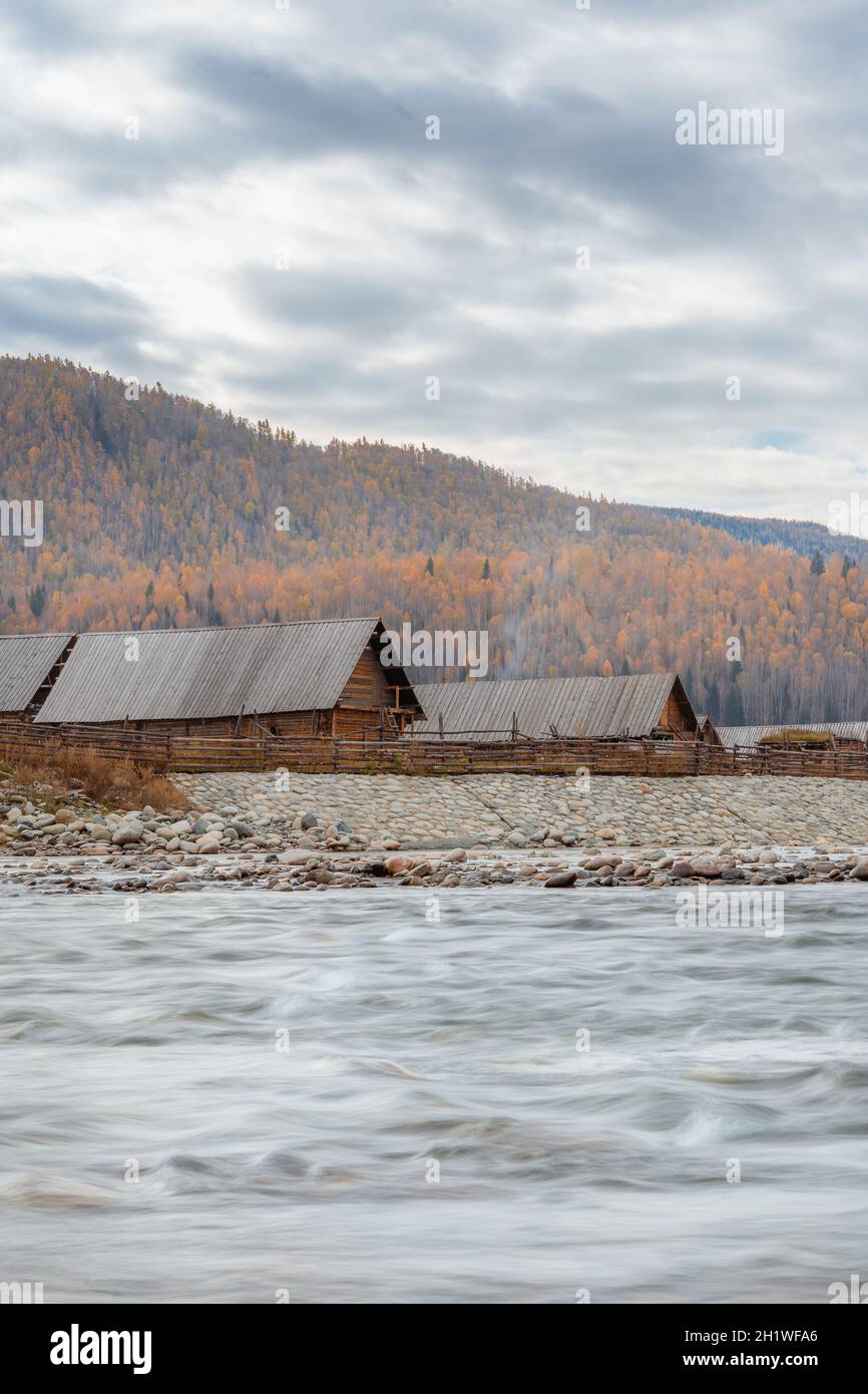 Autumn landscape of the river and forest in Hemu Village, a historic ...