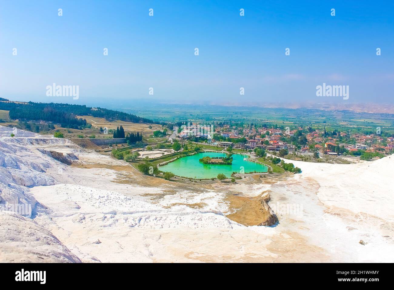 Travertines in Turkey. Calcite cliff of Pamukkale at sunny day Stock ...
