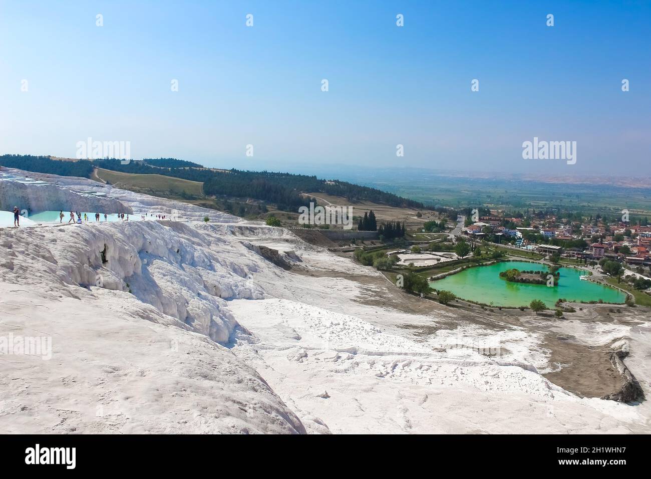 Travertines in Turkey. Calcite cliff of Pamukkale at sunny day Stock ...