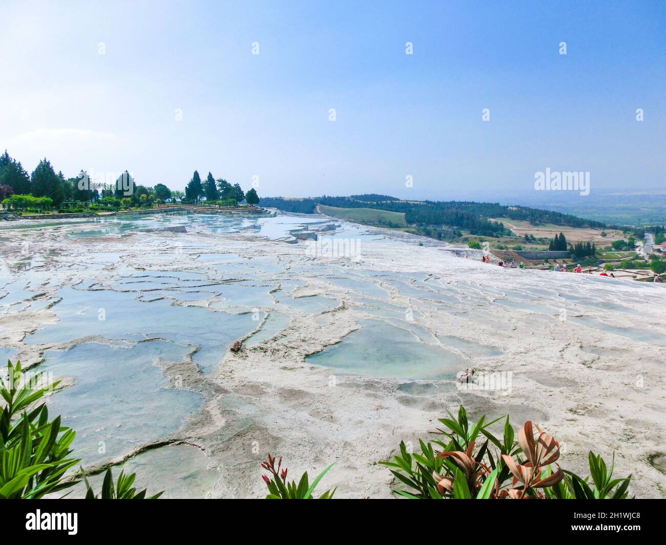 Travertines in Turkey. Calcite cliff of Pamukkale at sunny day Stock ...