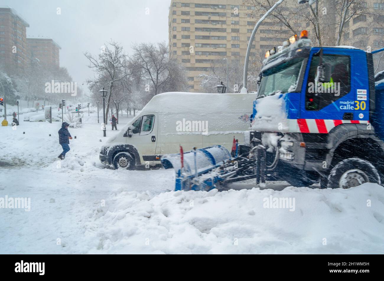 MADRID, SPAIN – JANUARY 9, 2021: Snowplow clearing streets during Storm ...