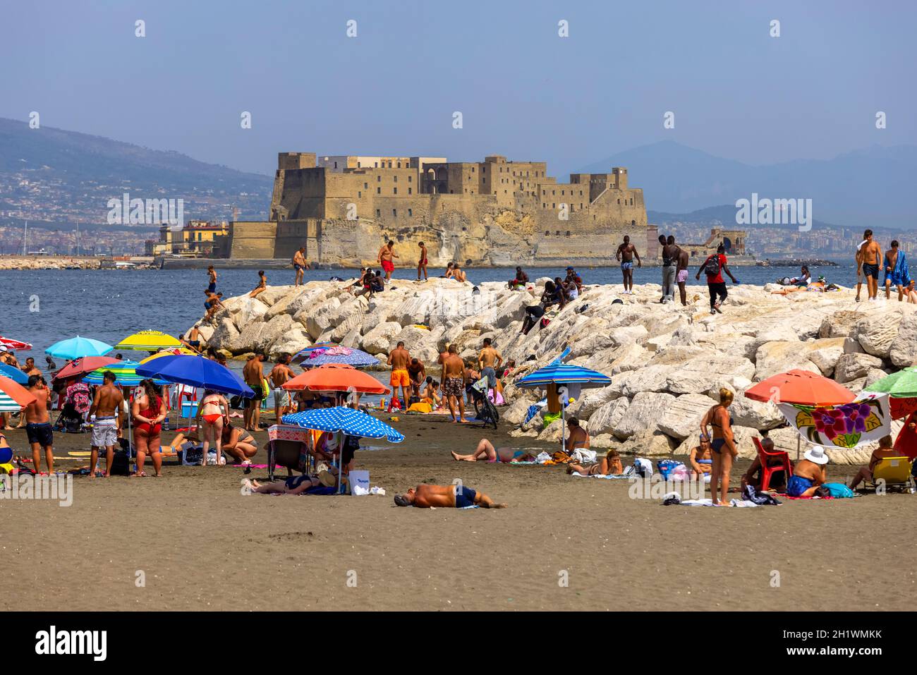 Naples, Gulf of Naples, Italy - June 27, 2021: People relaxing on the ...