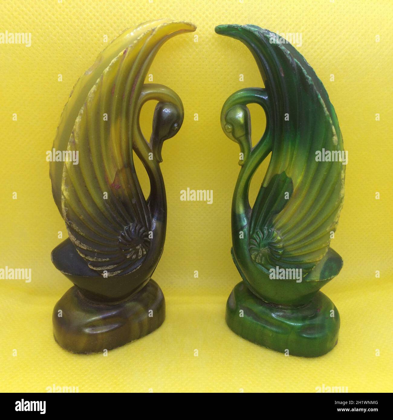 Yellow background two figures hi-res stock photography and images - Alamy