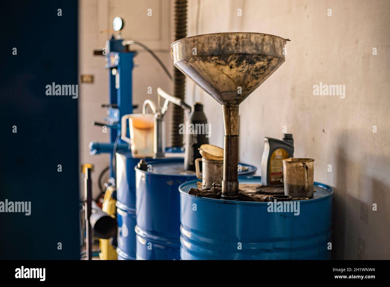 Used engine oil collection in a workshop, used oil barrel Stock Photo ...