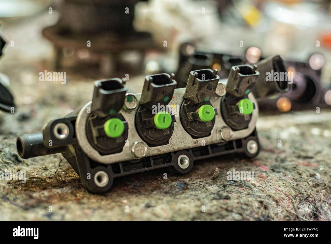 Detail of Car engine methane injectors on a workshop bench Stock Photo ...