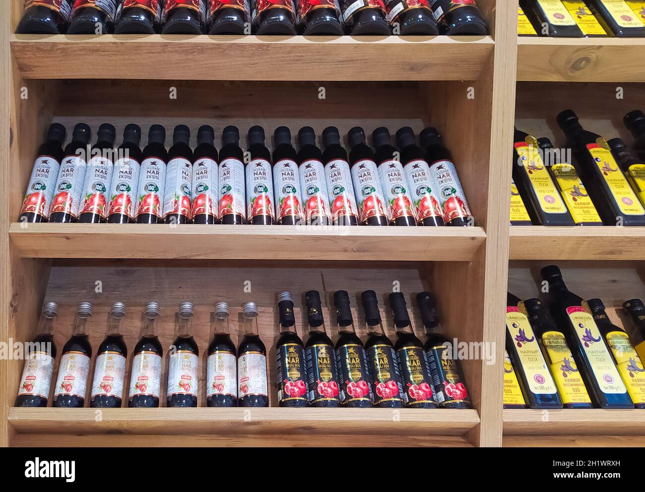 Antalya, Turkey - May 11, 2021: Organic carob syrup and pomegranate ...