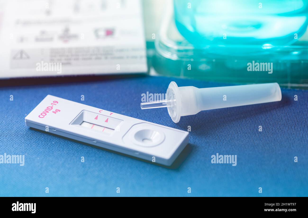 Covid 19 antigen self test for nasal swab with positive result. Antigen ...