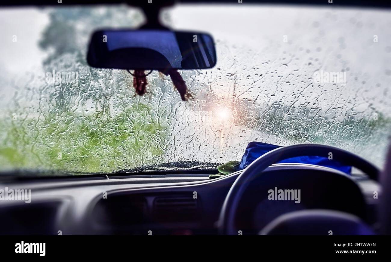 Abstract capture of Natural water drop on the Window glass from inside ...