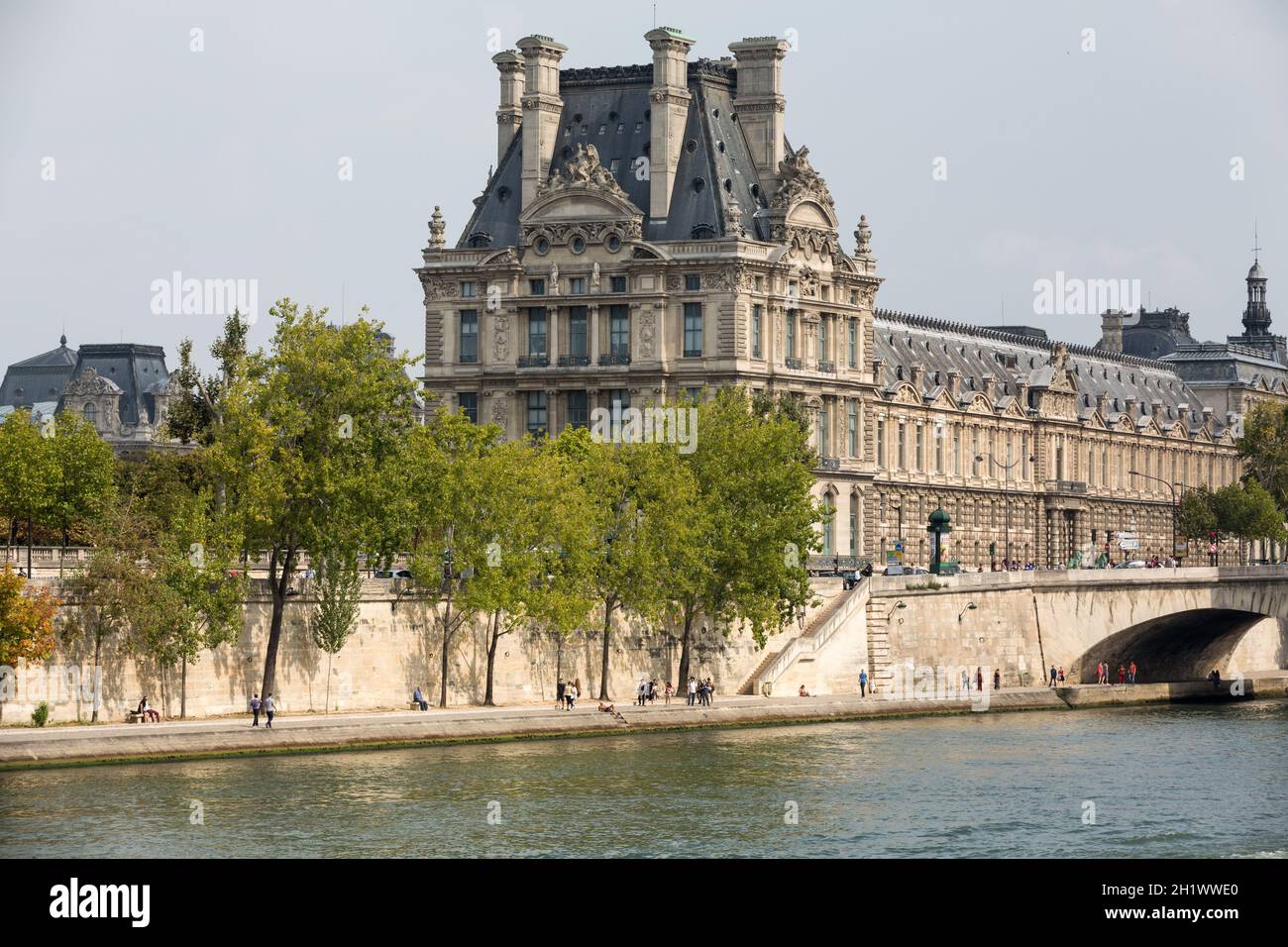 The Louvre and the Seine River in Paris . Louvre is one of the biggest ...