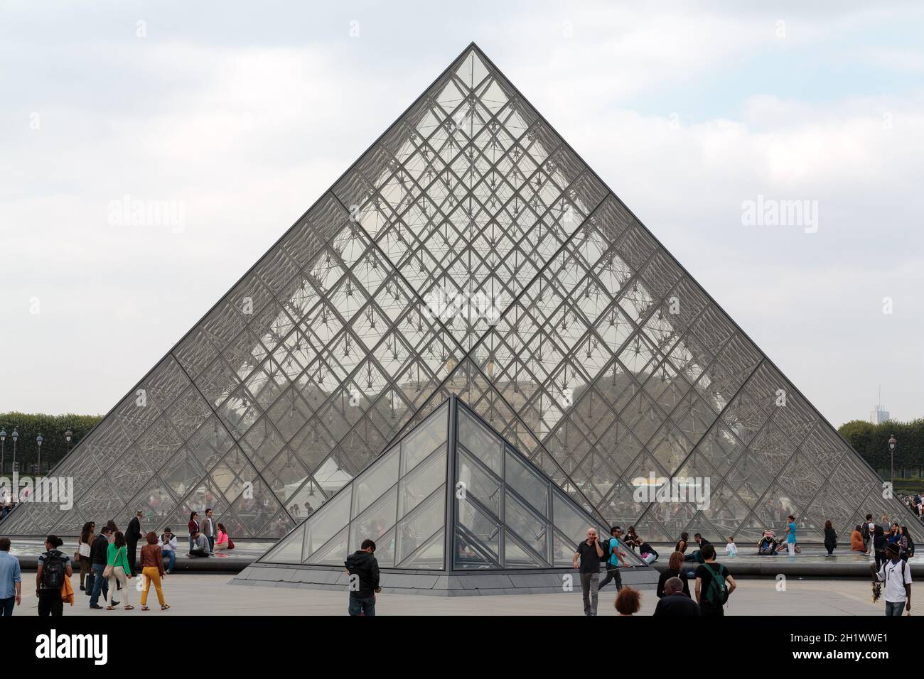 The Glass Pyramid in Louvre Paris, France. It serves as the main ...
