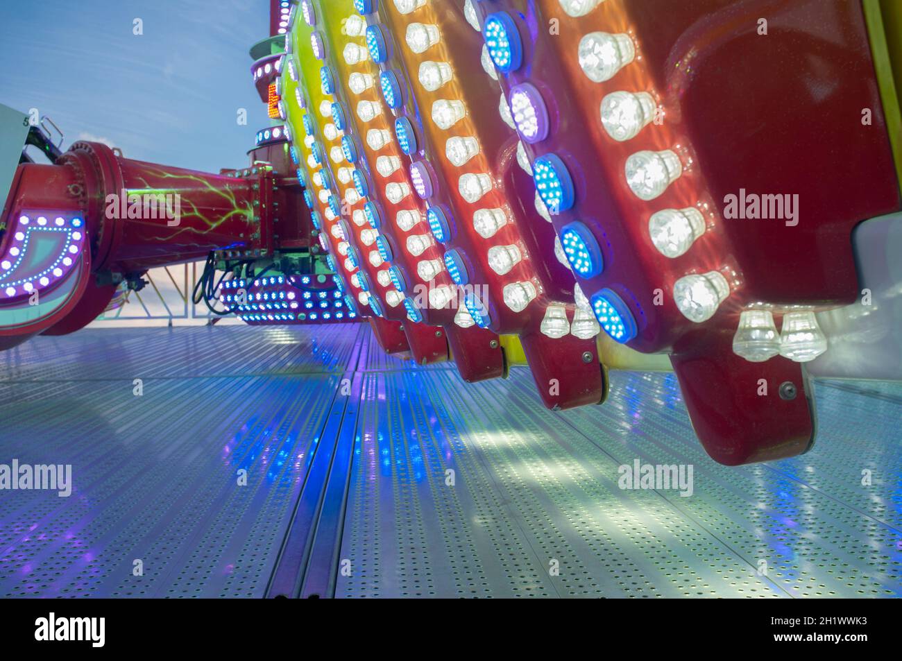 Fairground attraction plenty of leds. Sunset shot Stock Photo - Alamy