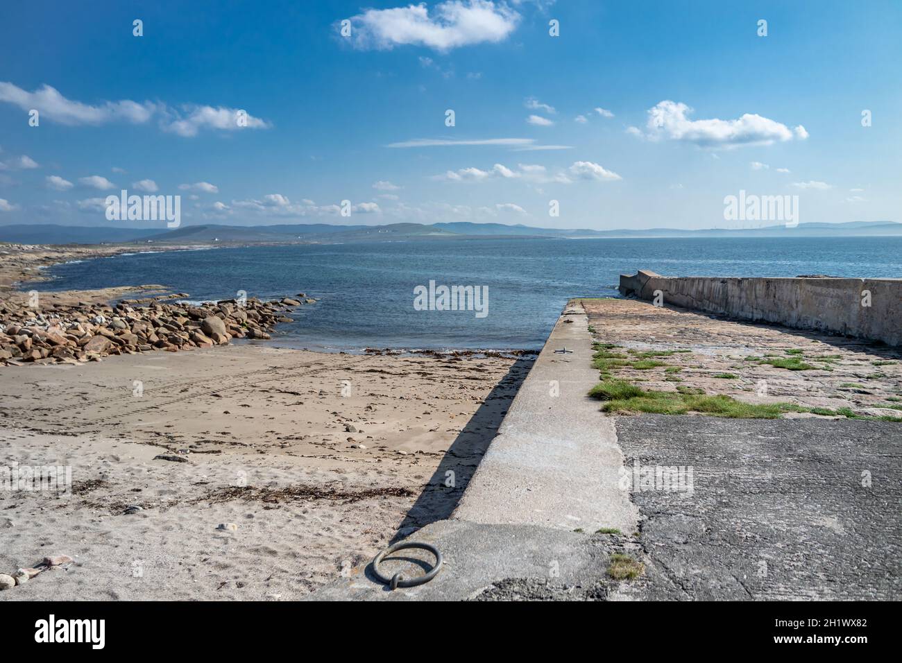 View of the pier by Marmeelan and Falcorrib south of Dungloe, County ...