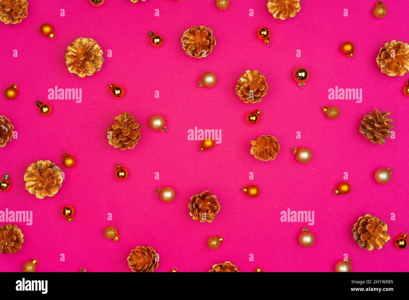 Pink background with Christmas holiday decorations pattern Stock Photo ...