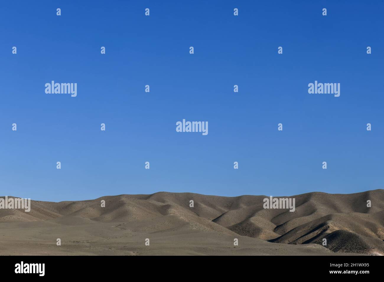 Mountain texture and blue sky, space for text Stock Photo - Alamy
