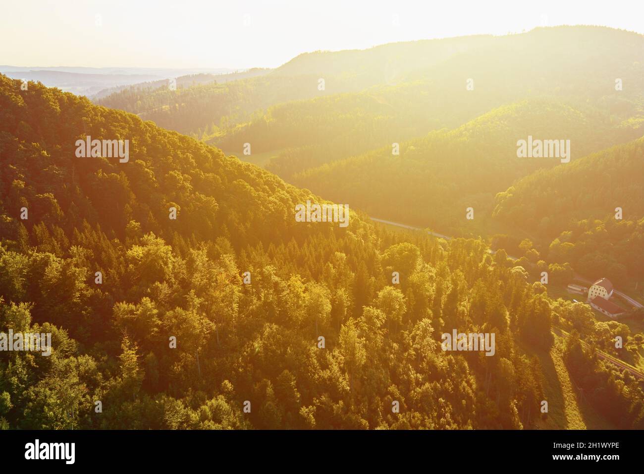 Mountain background. Beautiful sunrise over forest mountains range ...