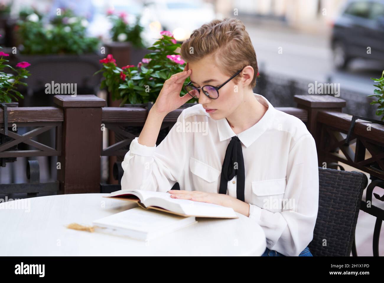 female in a summer cafe on the street vacation in the city summer ...