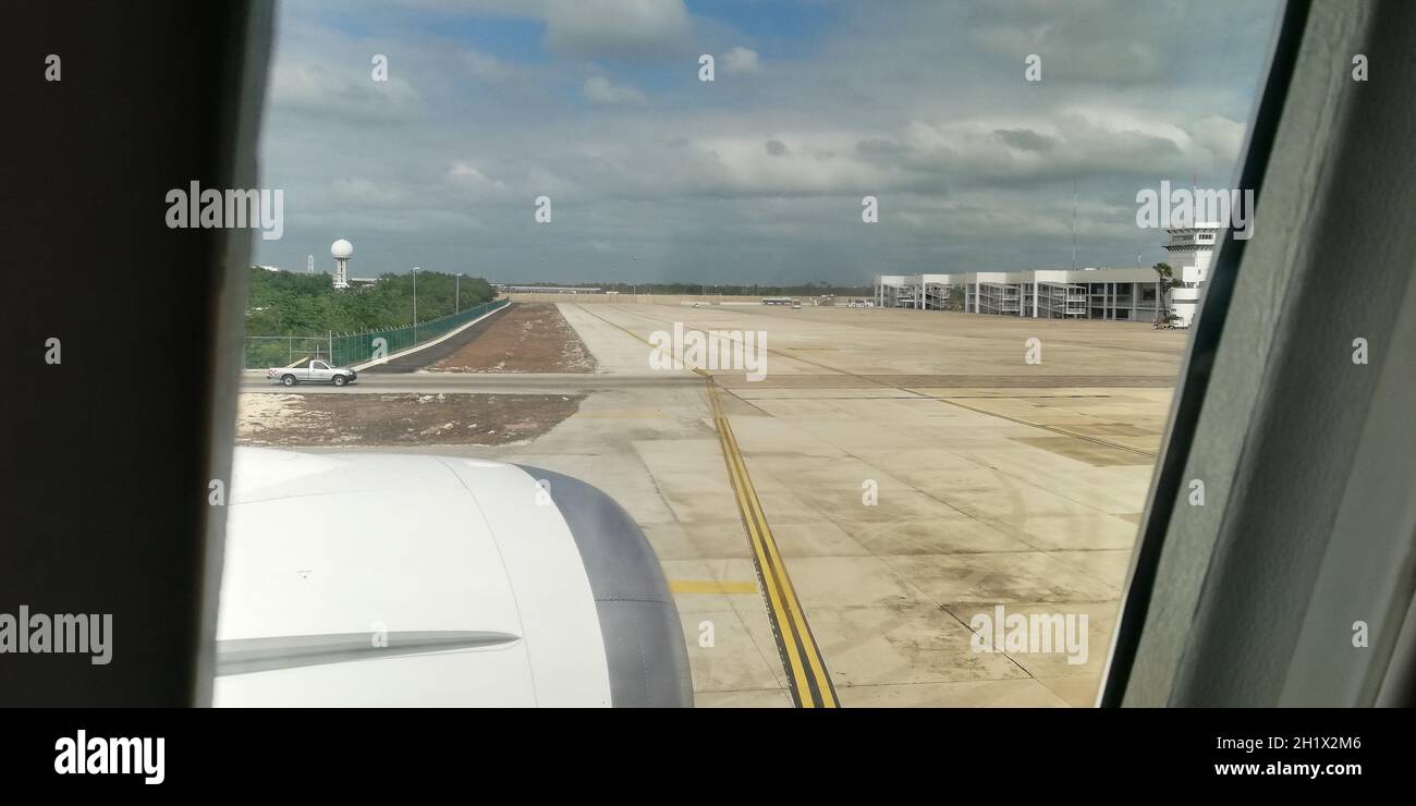 Detail of Cancun airport seen from the airplane window Stock Photo - Alamy