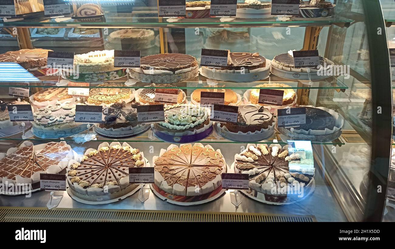 Cakes on the showcase of confectionery. Shop for sweet tooth. variety ...