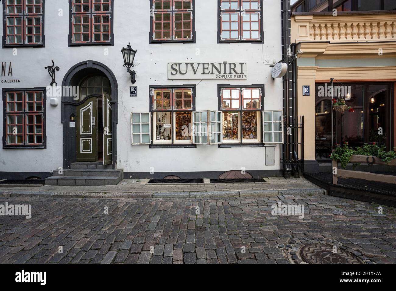 Riga, Latvia. August 2021. A souvenir shop in a typical building in the ...