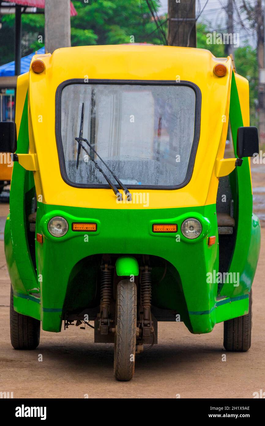 Green and yellow eco-friendly electronic tuk tuk vehicle car rickshaw ...