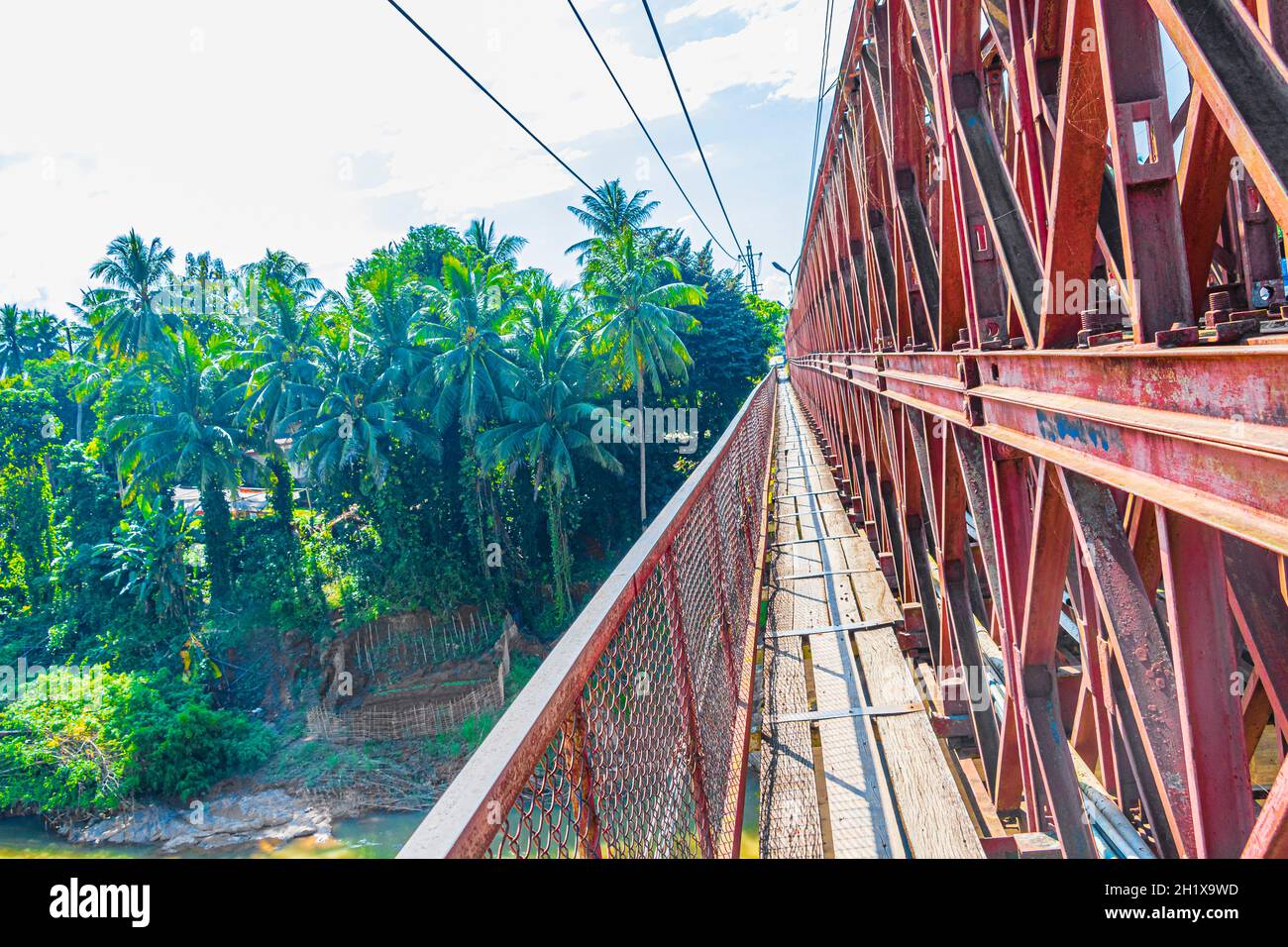 Old French Bridge of wooden board in Luang Prabang Laos Asia Stock ...