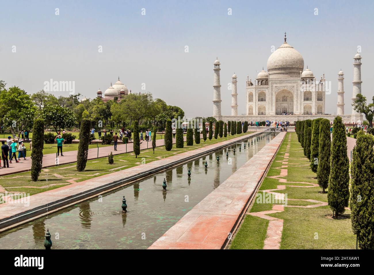 Taj Mahal in Agra, India. Mogul marble mausoleum with minarets, mosque ...