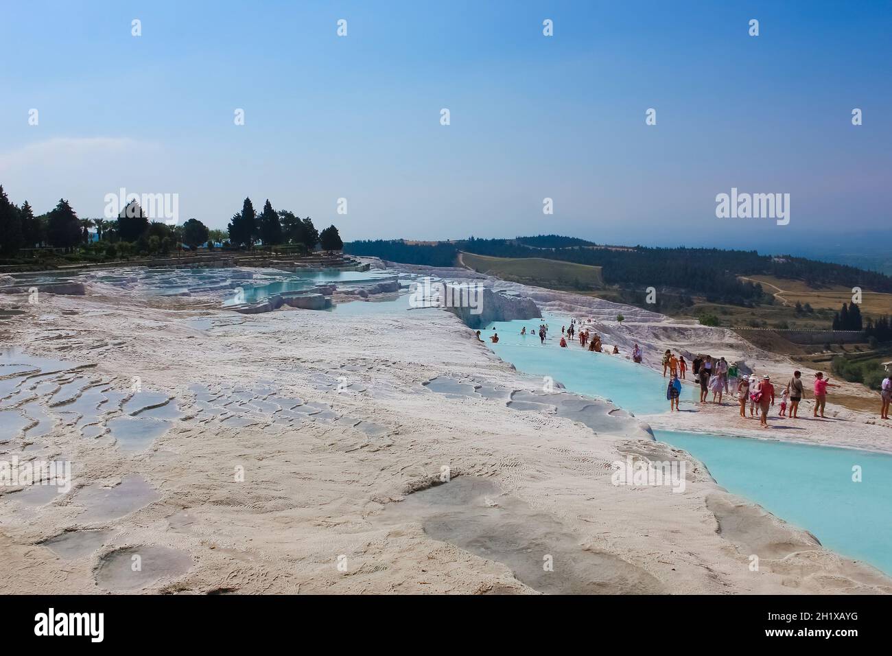Travertines in Turkey. Calcite cliff of Pamukkale at sunny day Stock ...