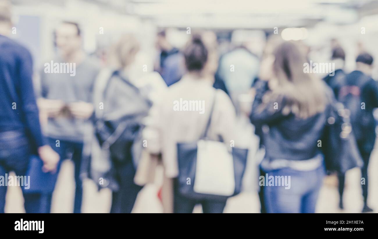 Blured image of businesspeople socializing and networking during coffee ...