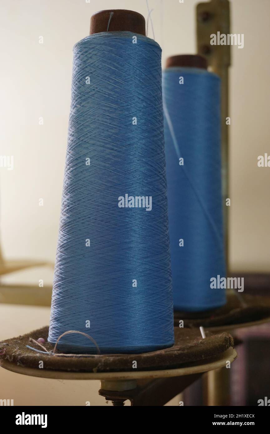 Red color sewing strings hi-res stock photography and images - Alamy