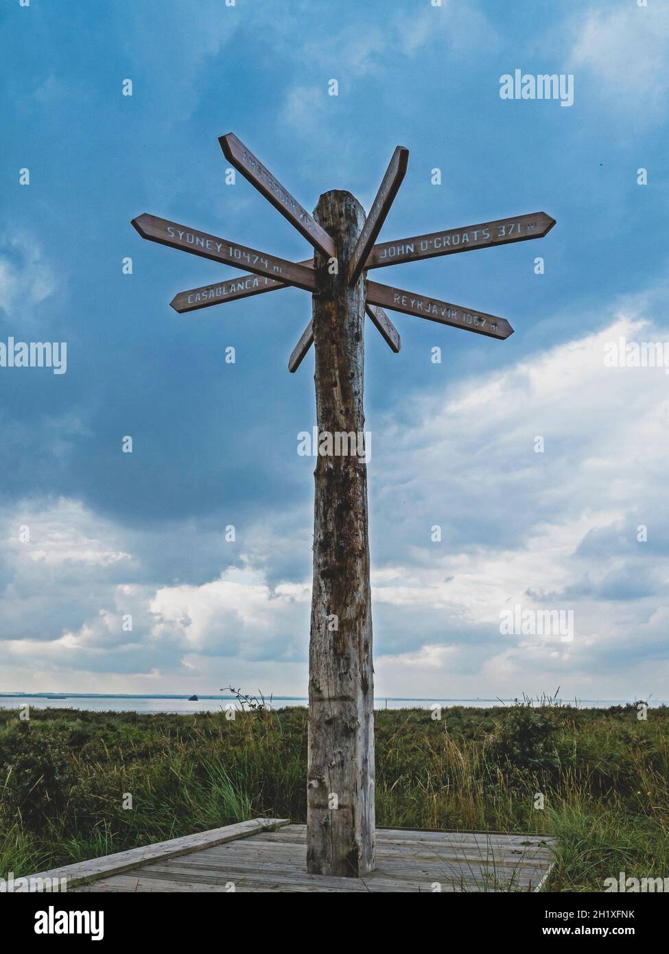Signpost showing directions and distances at Spurn Point, East ...