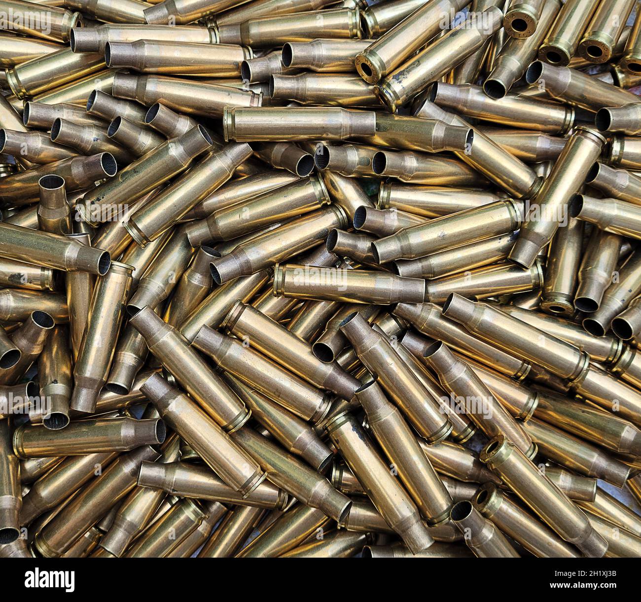 Empty bullet shells for background Stock Photo - Alamy