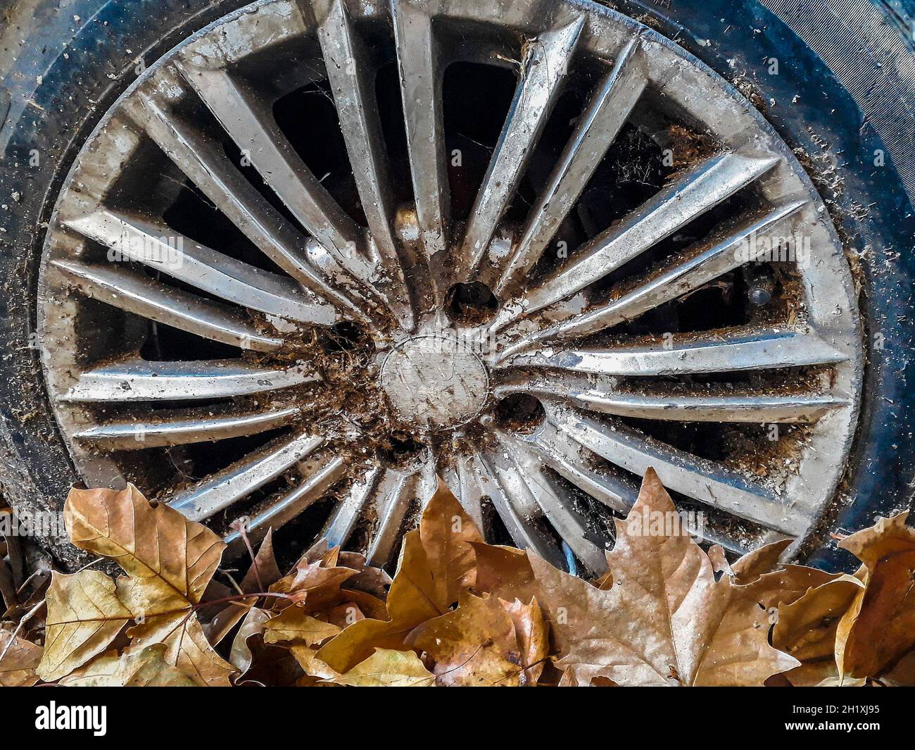 Close up shot wasted dirty car wheel photo Stock Photo - Alamy