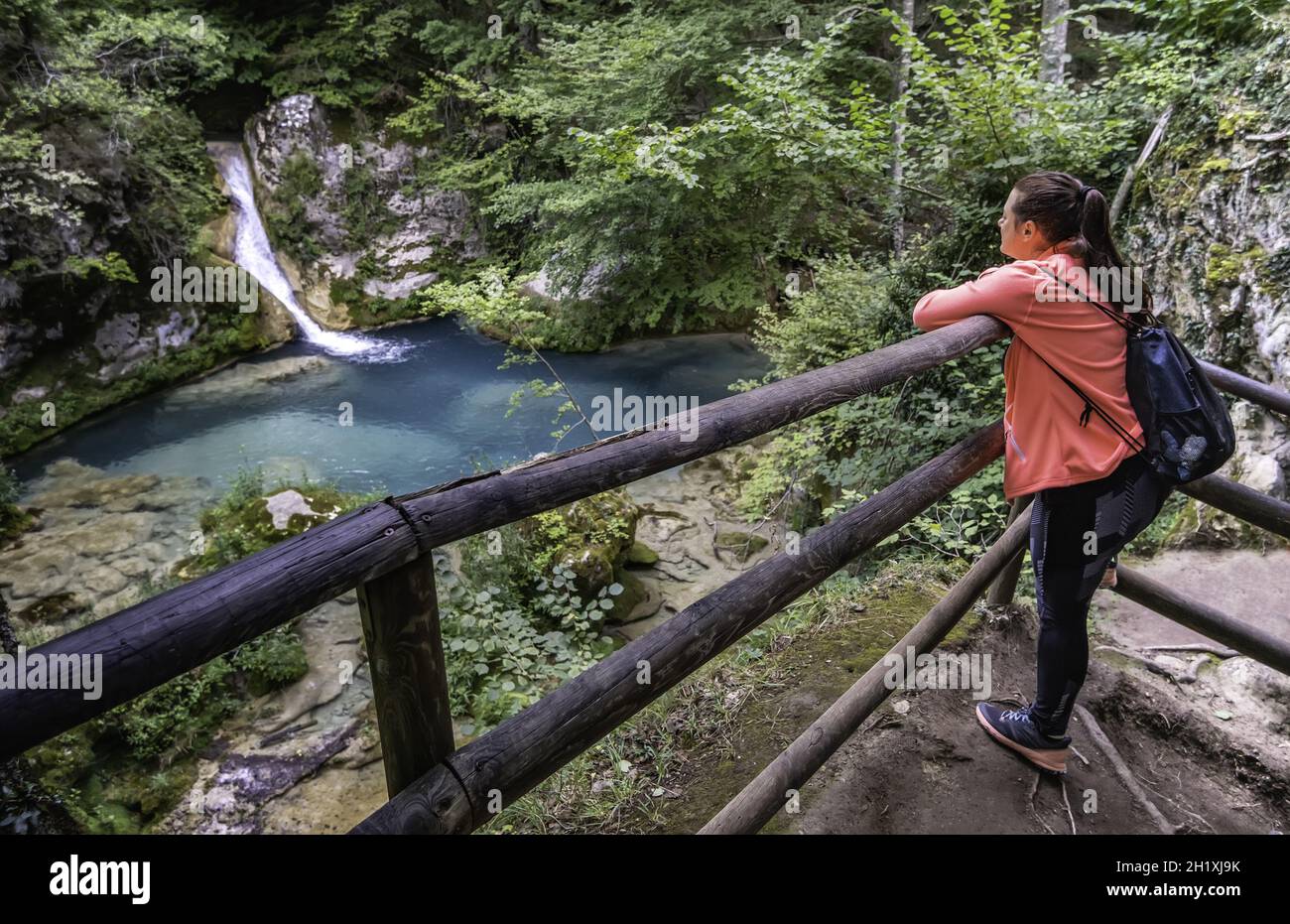 Woman walking tropical forest waterfall hi-res stock photography and ...