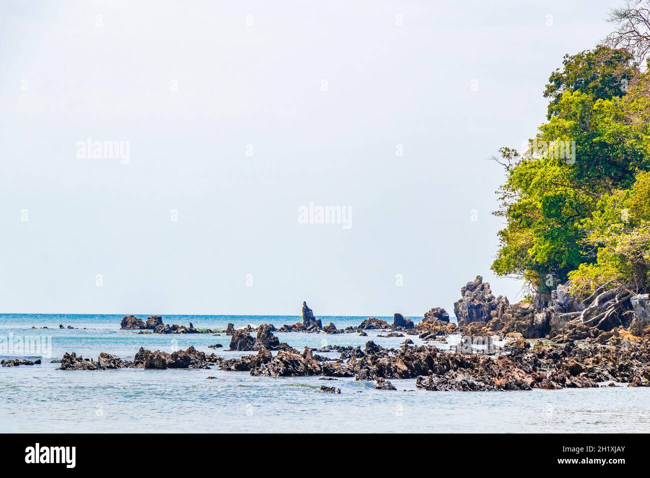 Rocky corner at tropical Paradise island Koh Phayam Aow Yai Beach ...