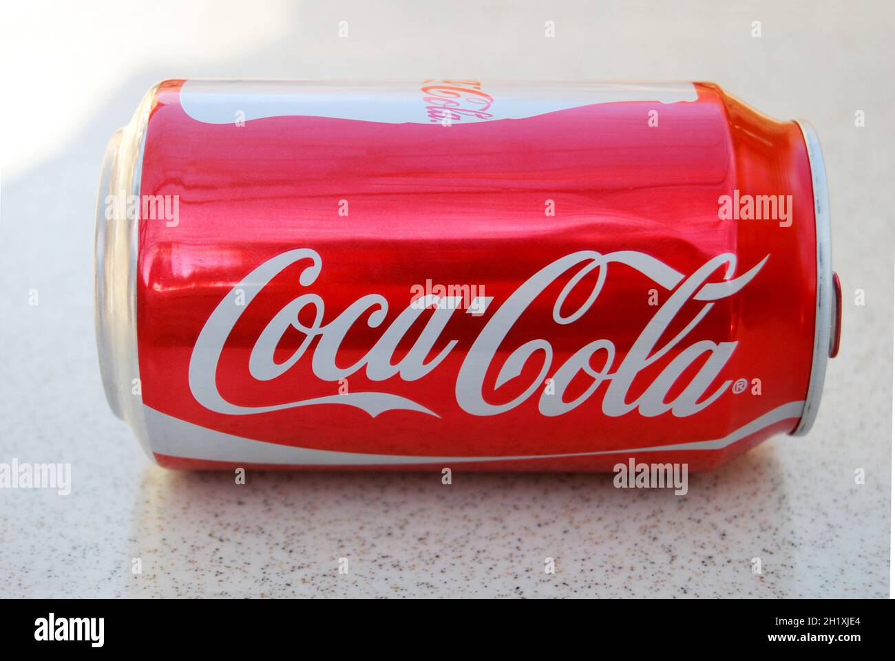 The world's most drinking cola brand, Coca Cola, red colored aluminum ...