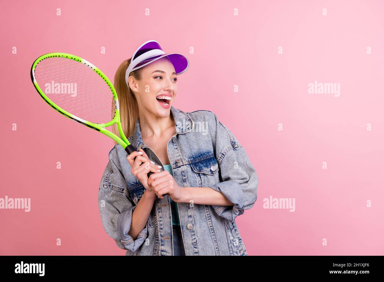 Photo of hooray young sporty lady hold racket look empty space wear ...