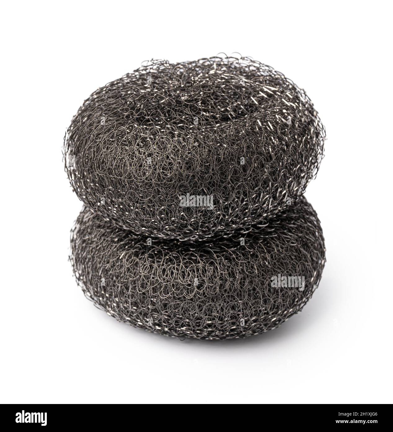 Metal sponge for washing dishes on a white background Stock Photo - Alamy