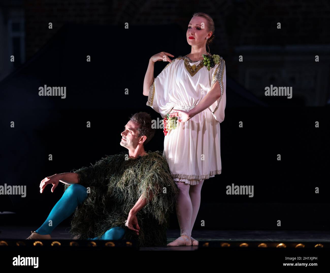 Krakow, Poland - July 25, 2021: Artists in costumes performing on stage ...