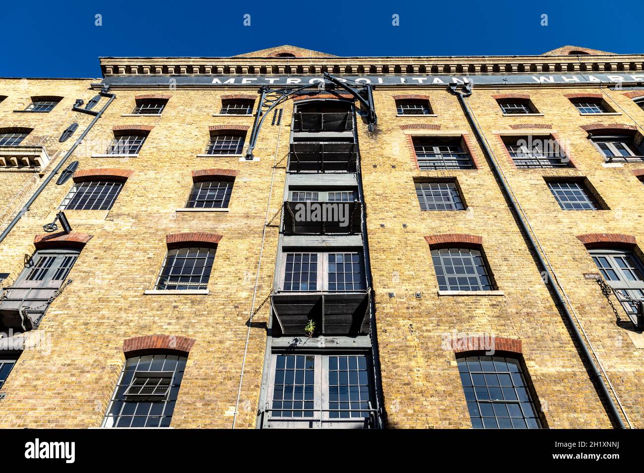Exterior of converted warehouse building Metropolitan Wharf, Wapping ...
