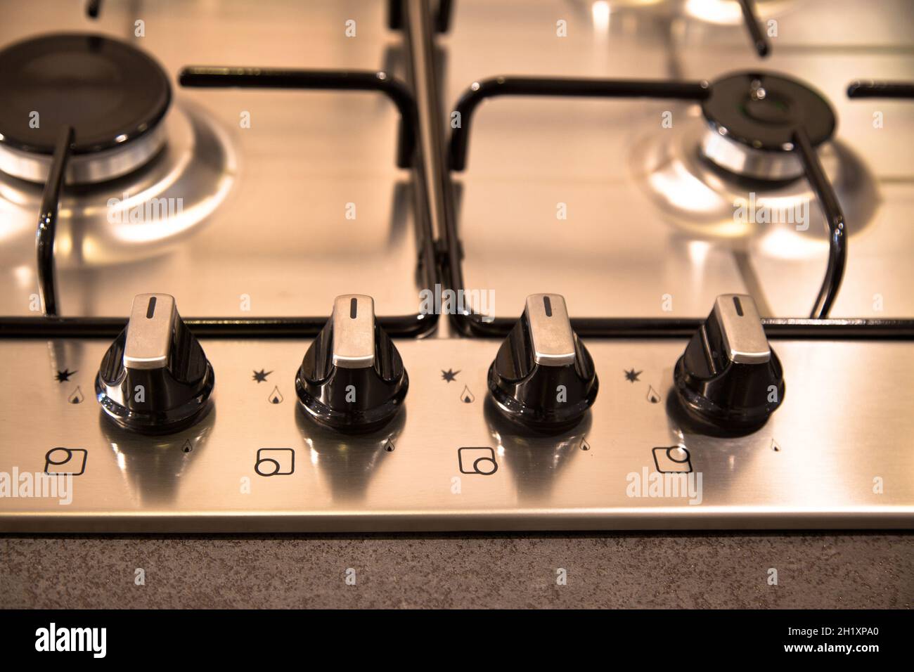 Modern luxurious kitchen and stainless steel built-in gas oven buttons ...