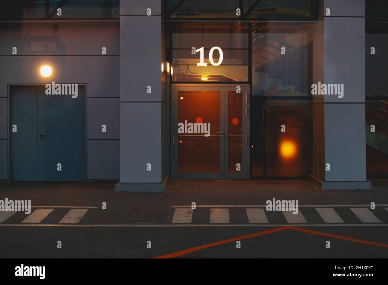 Exterior of a gate number 10 of airport terminal Stock Photo - Alamy