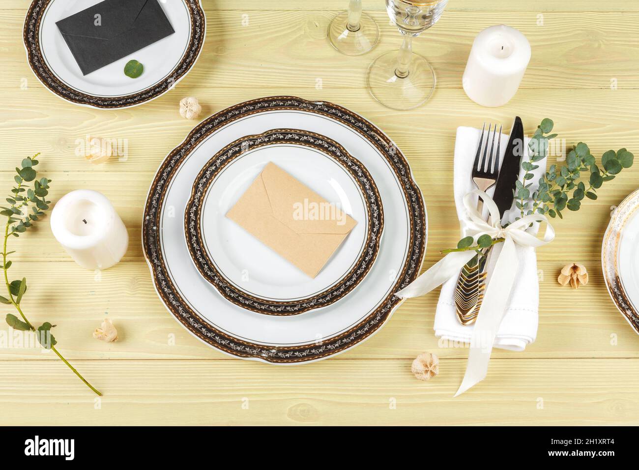 Table with plates and cutlery, view from above Stock Photo - Alamy