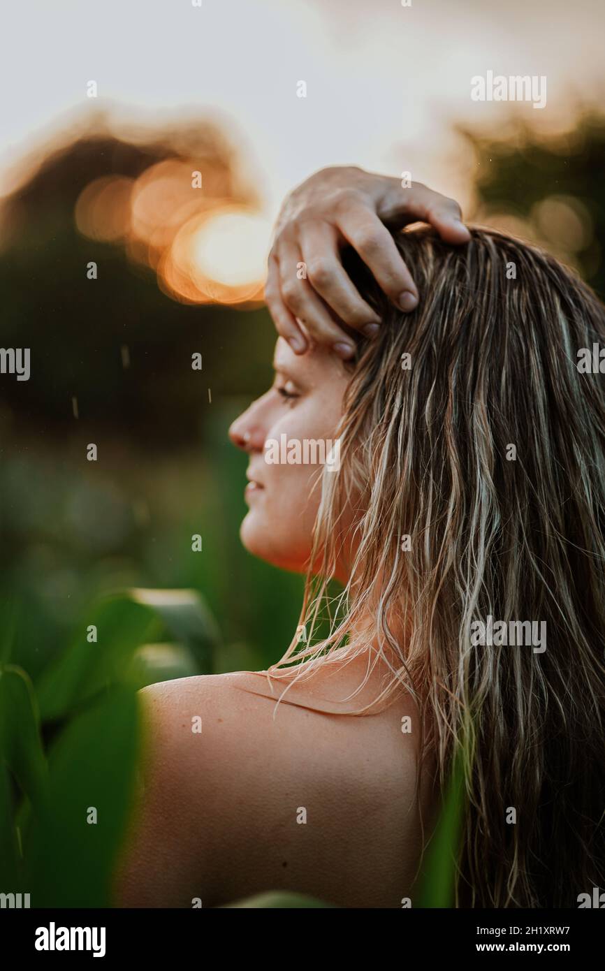 Blonde woman in corn field body positivity shoot Stock Photo - Alamy